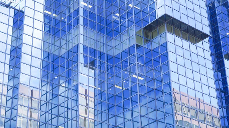 High Rise Blue Glass Office Building Reflecting Sun and City Structures ...