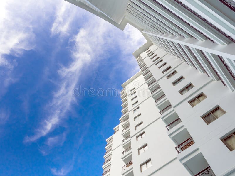 High Rise Building and Bright Blue Sky Stock Photo - Image of high ...