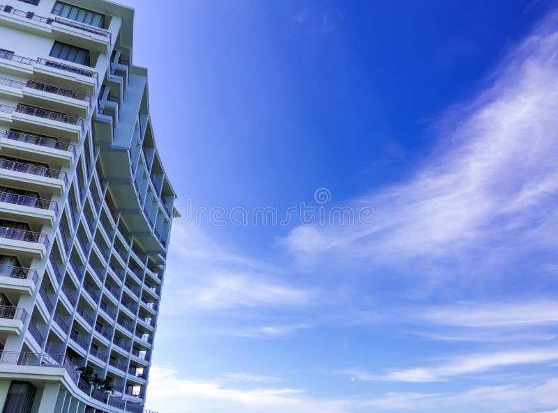 Highrise Building and Bright Blue Sky Stock Image - Image of building ...