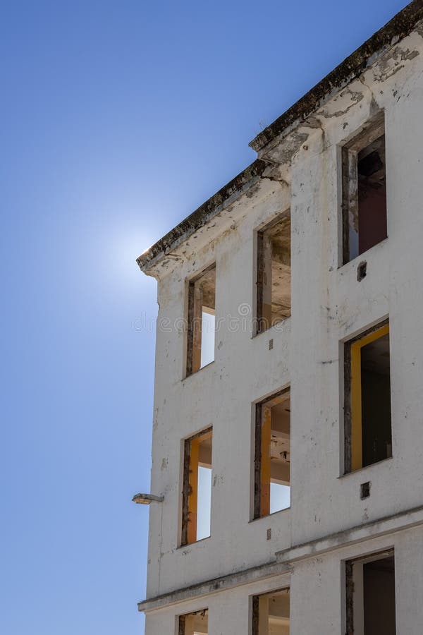 High Rise Building with Broken Windows Illuminated by Daylight ...