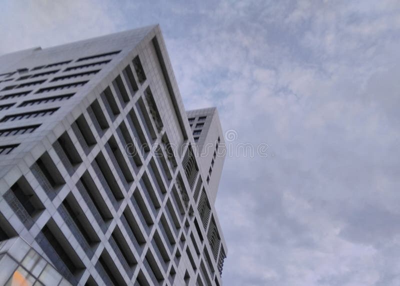 High-rise Building with a Cloudy Sky Stock Image - Image of landmark ...