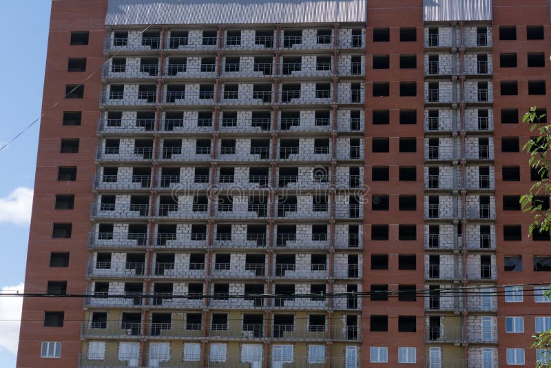 High-rise Building Construction Site with Yellow Tower Crane . Stock ...