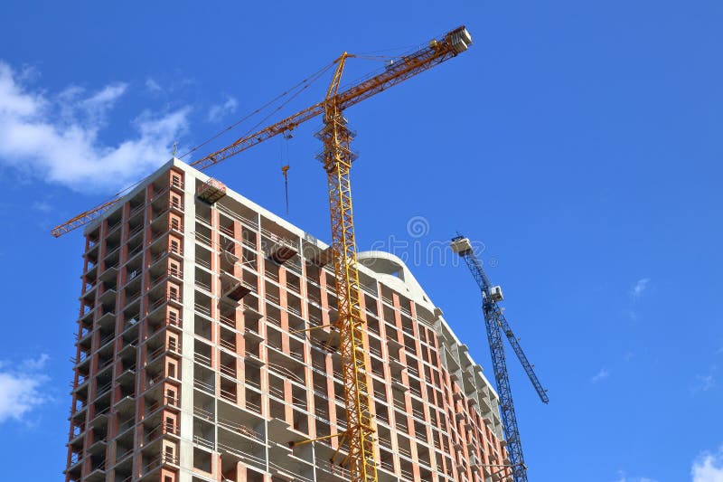 High-Rise Building Construction with Tower Cranes Stock Photo - Image ...