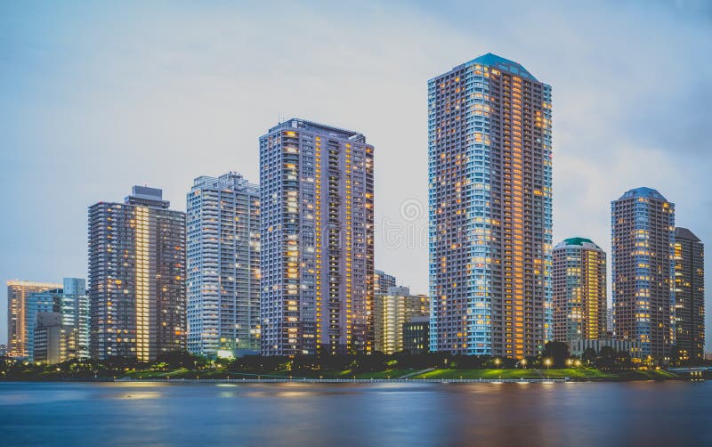 Eco Architecture. Green Skyscraper Building with Plants Growing on the ...