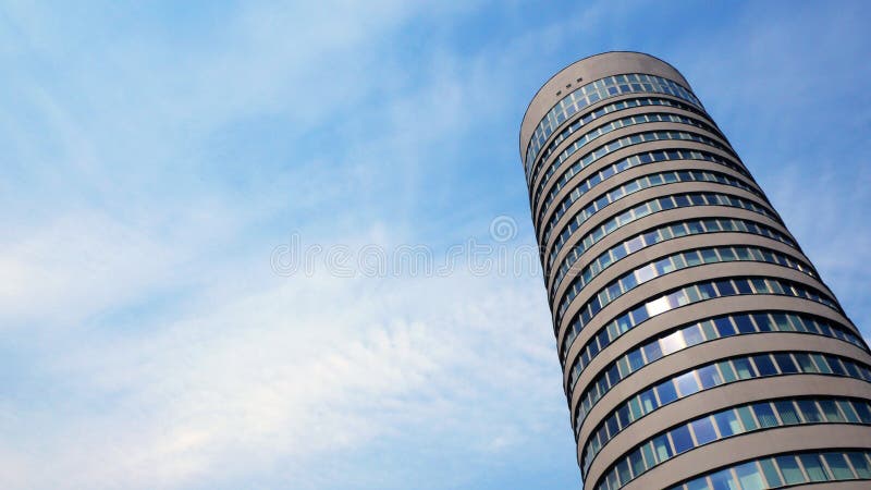 High-rise Building Facade Colored Against the Sky Stock Image - Image ...