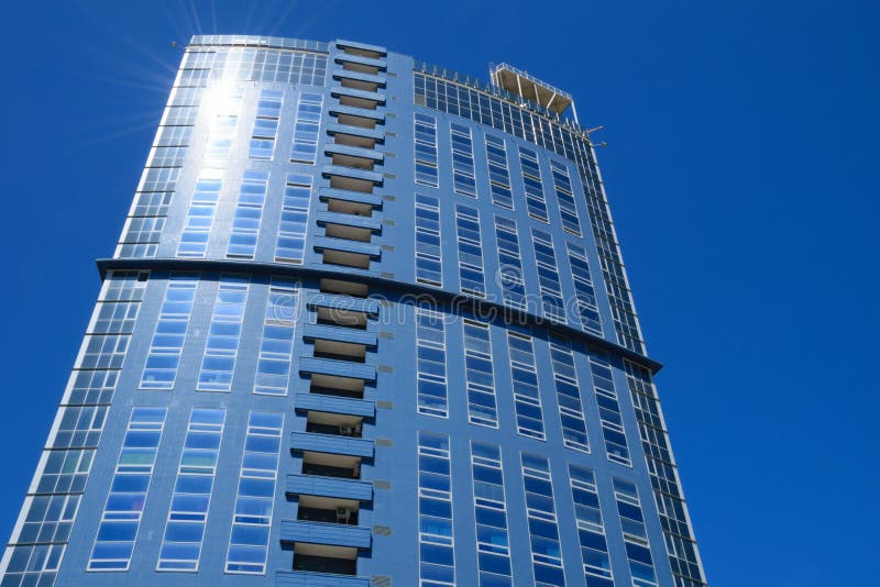 High-rise building facade stock image. Image of building - 77607929