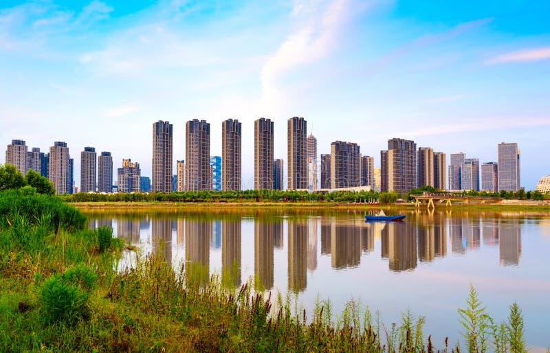 High Rise Building by the River Stock Photo - Image of district ...