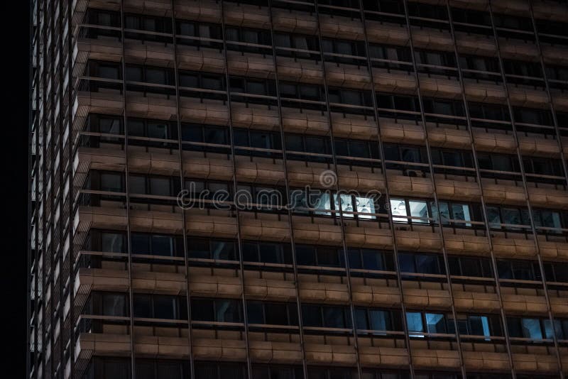 High-rise Building with Some Windows with Burning Light Stock Image ...