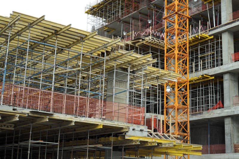 High-rise Building Under Construction with a Waterproofing and Warming ...