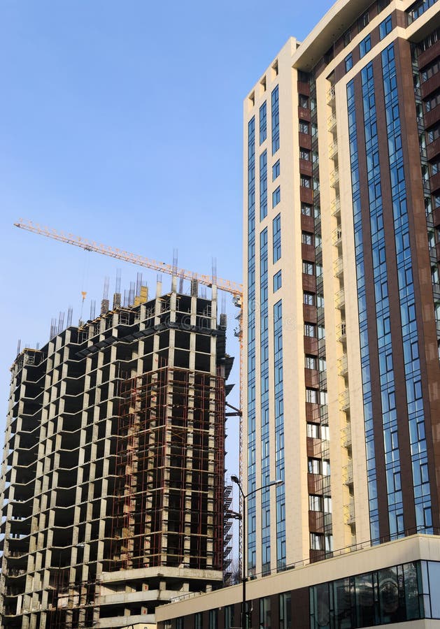 High-rise Building Under Construction and Crane Stock Photo - Image of ...