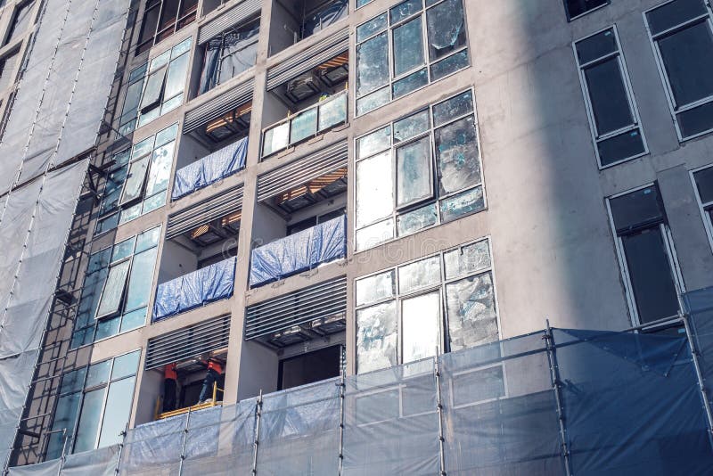 High-rise Window Washers with Scaffold System Stock Image - Image of ...