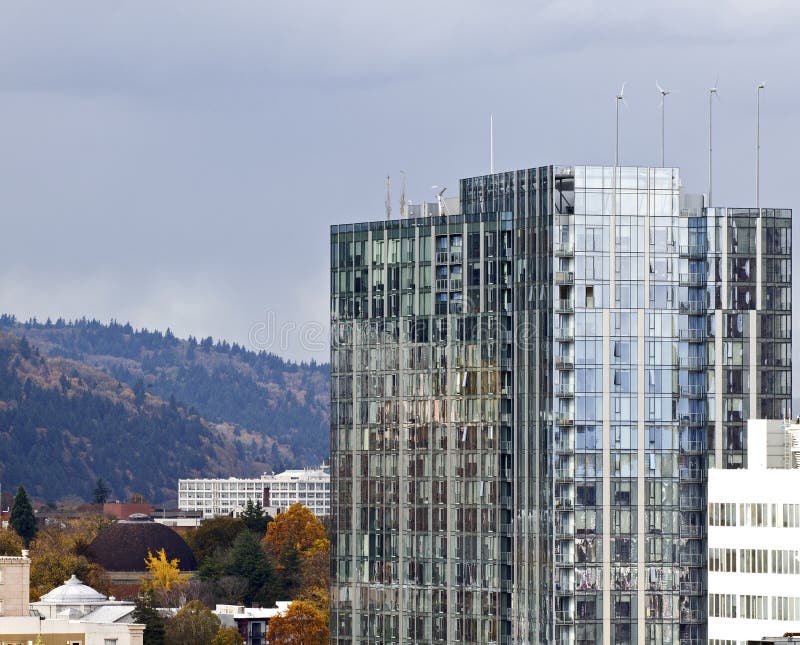 High Rise Building with Wind Turbine Energy Stock Image - Image of ...