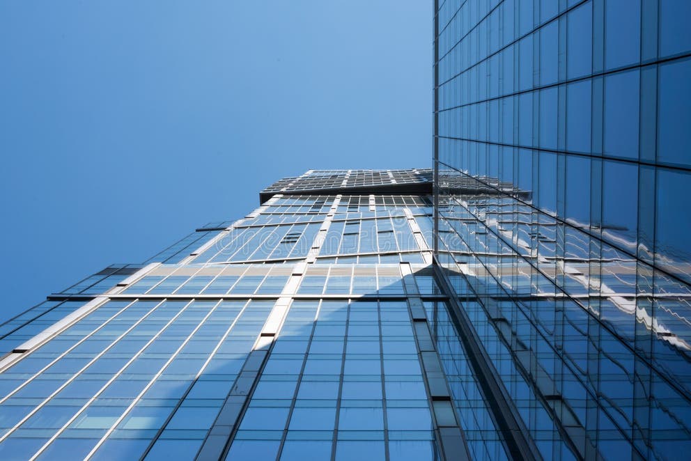 High-rise Buildings on Blue Sky, Bottom View Stock Photo - Image of ...