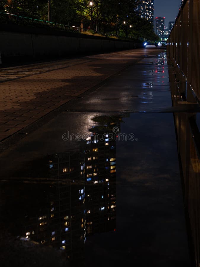 High Rise Buildings Reflected in the Rain in Tokyo Stock Image - Image ...