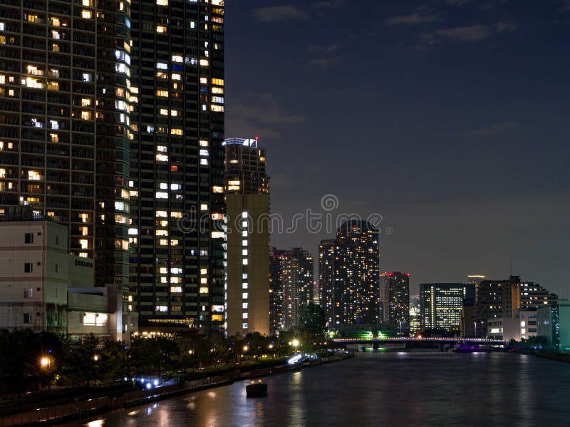 High Rise Buildings in Tokyo Reflected in a River Stock Image - Image ...