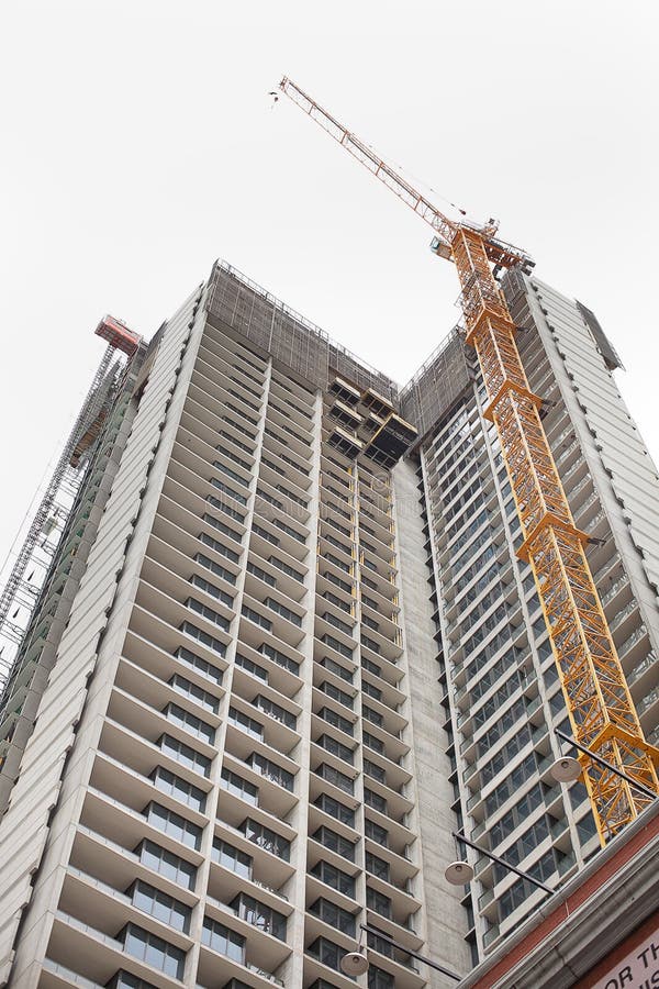 High rise construction stock photo. Image of industry - 74704560