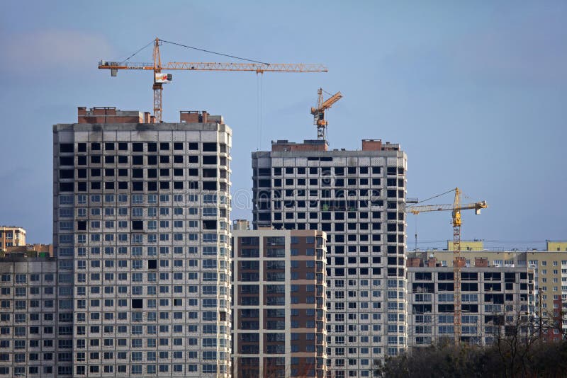 High-rise Construction Cranes and Array of Buildings Under Construction ...