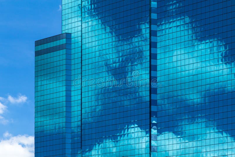 High-rise Glass Building with Sky and Clouds Reflection Stock Photo ...