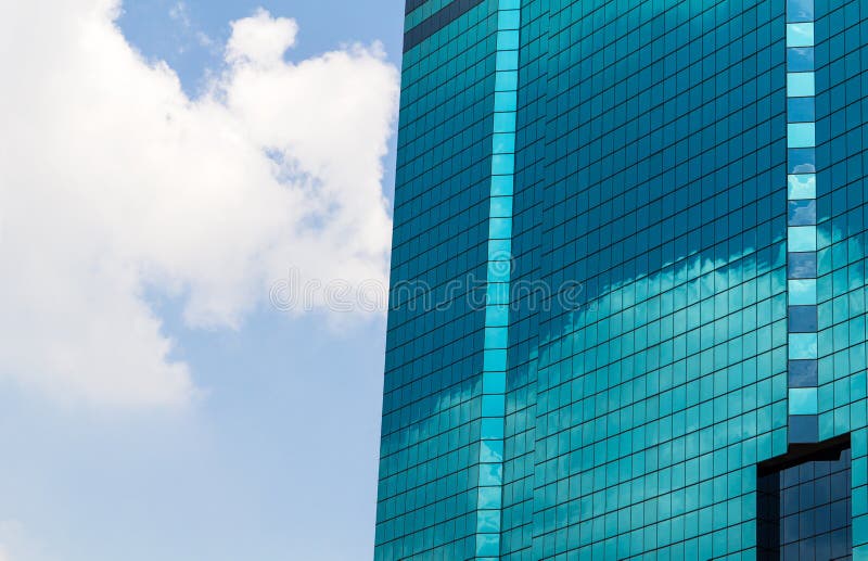 High-rise Glass Building with Sky and Clouds Reflection Stock Photo ...