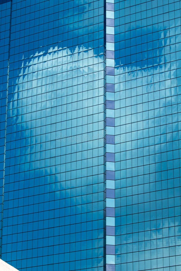 High-rise Glass Building with Sky and Clouds Reflection Stock Image ...