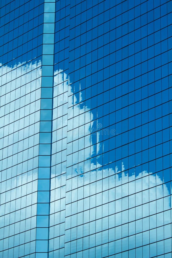 High-rise Glass Building with Sky and Clouds Reflection Stock Photo ...