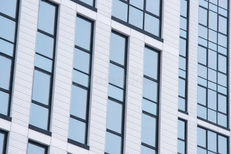 A High-rise Office Building with Blue Glass Windows Stock Image - Image ...