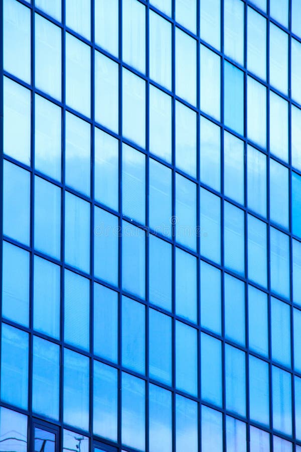 A High-rise Office Building with Blue Glass Windows Stock Photo - Image ...