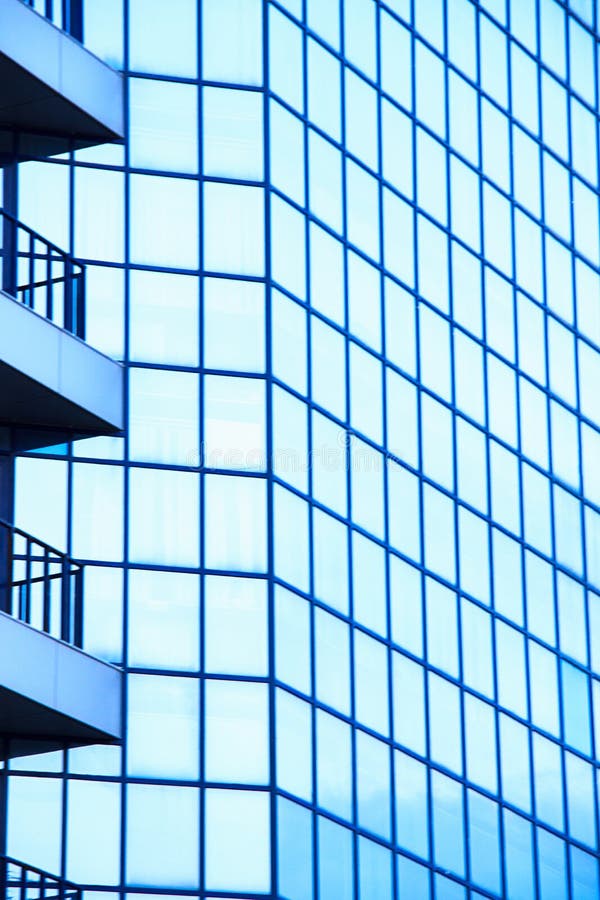 A High-rise Office Building with Blue Glass Windows Stock Photo - Image ...