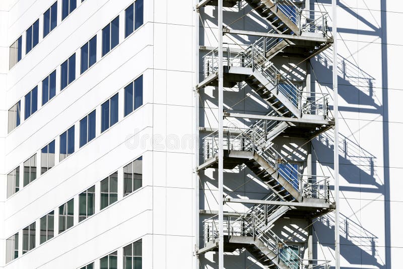 High Rise Office Building with Shadow of Metal Fire Escape Stock Photo ...