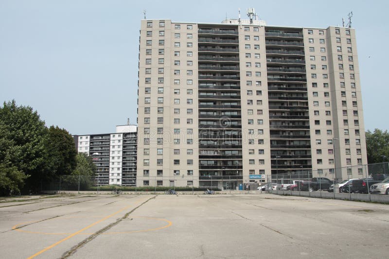 High Rise White and Black Apartment Building with Another Apartment ...