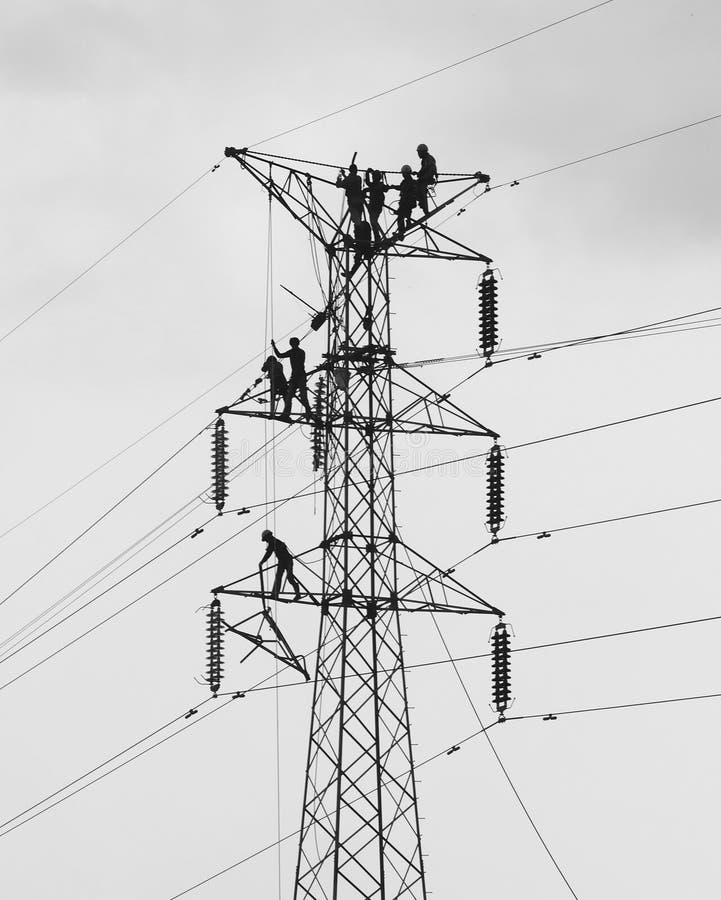 High Risk Job at the Electric Tower Stock Photo - Image of risk ...