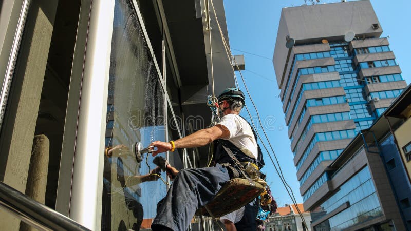 Window Washers on a Office Building Stock Photo - Image of ...