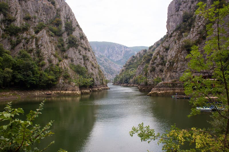 High Rocky Mountains on the Banks of the River Stock Photo - Image of ...