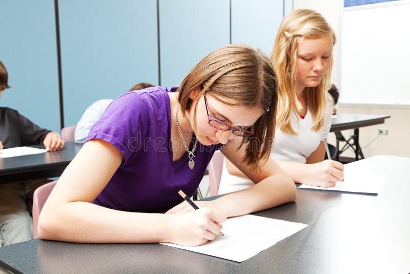 High School Academic Testing Stock Image - Image of serious, brown ...
