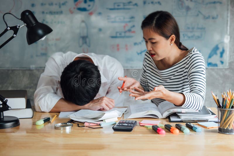 High School or College Asian Student Group Sitting at Desk in Cl Stock ...