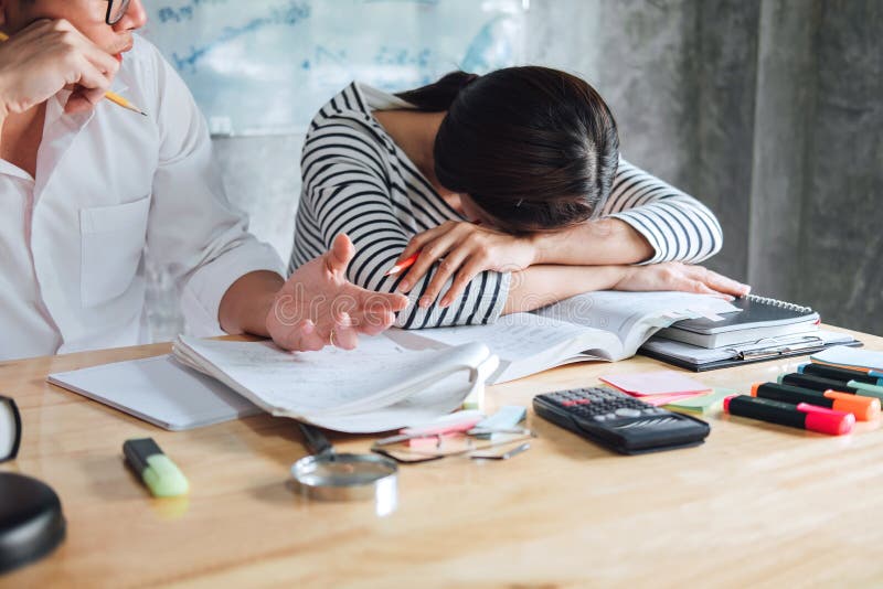 High School or College Asian Student Group Sitting at Desk in Cl Stock ...