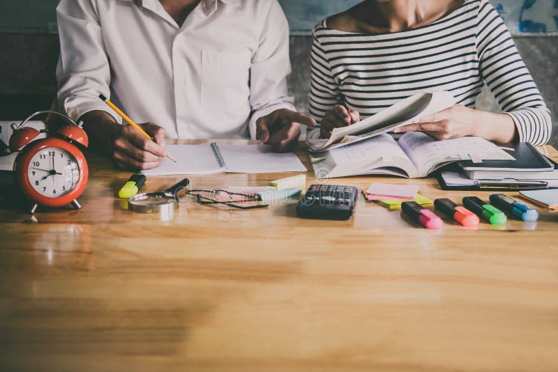 High School or College Asian Student Group Sitting at Desk in Class ...