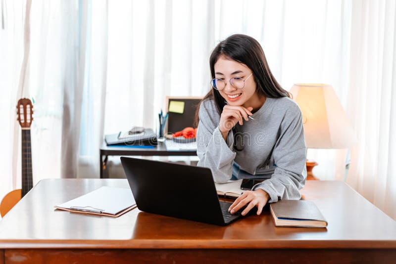 High School or College Student Learning Tutoring on Desk and Reading ...