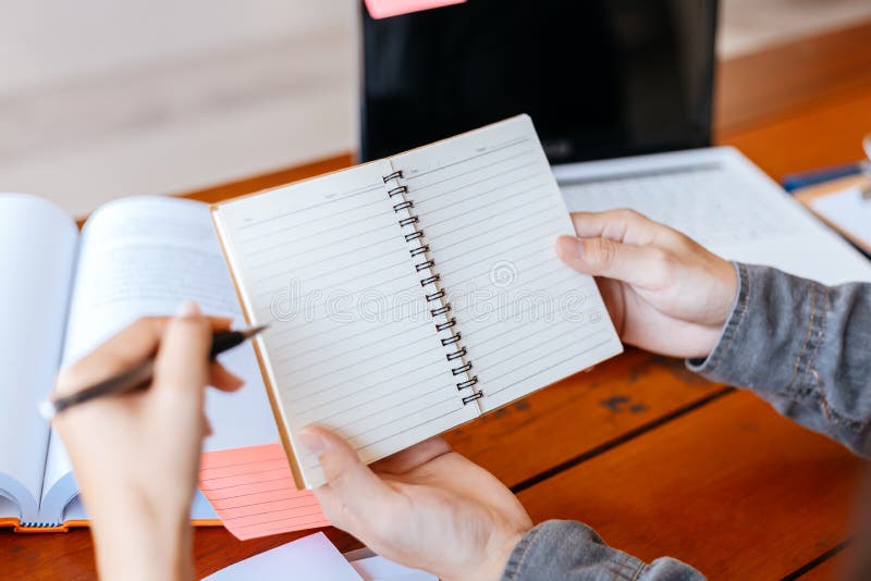 High School or College Students Group Catching Up Workbook and Learning ...
