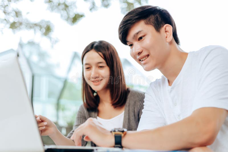 High School or College Students Group Catching Up Workbook and Learning ...