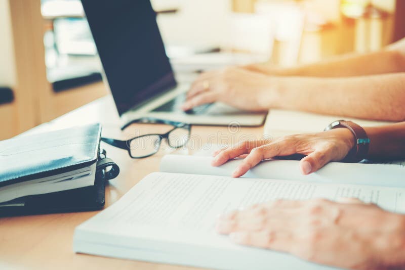 High School or College Students Studying and Reading Together in Stock ...