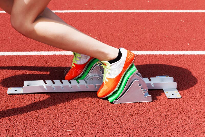 High School Female Sprinter in the Blocks Stock Image - Image of ...
