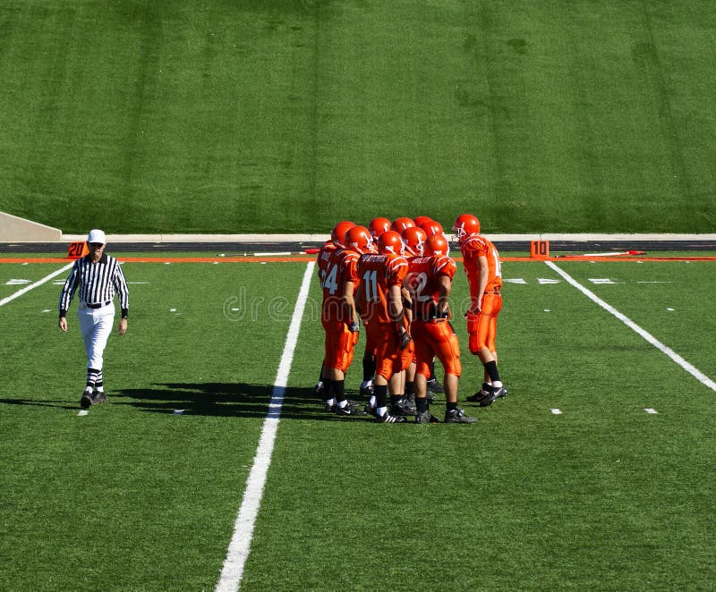 High School Football Team Huddle Banner Editorial Photography - Image ...