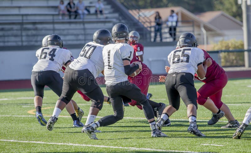 High school football game stock image. Image of standing - 99072859