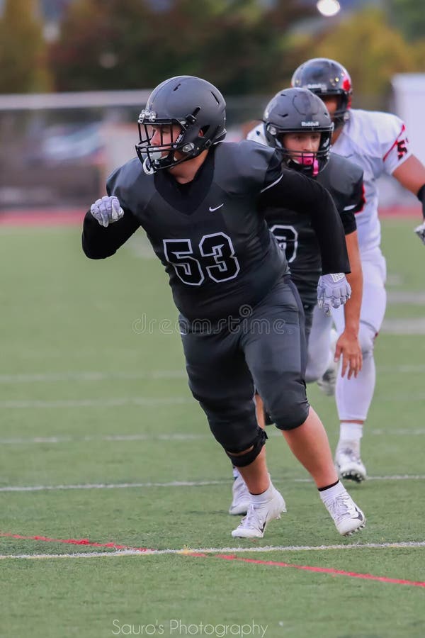 High School Football Team Members Editorial Photo - Image of boys ...