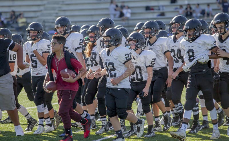 High school football team editorial image. Image of helmets - 99070660