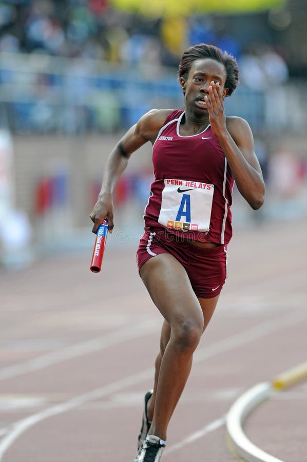 High School Girls 4x400 Relay Runner Editorial Photo - Image of ...