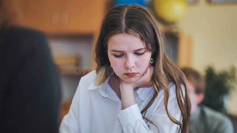High School Girls at a Desk in the Classroom during Class. Stock Image ...