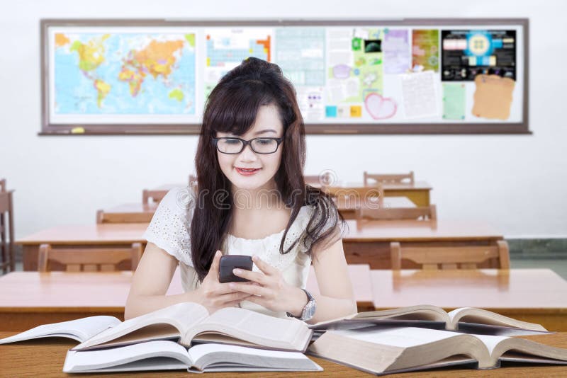 High School Learner Using Smartphone in Class Stock Photo - Image of ...