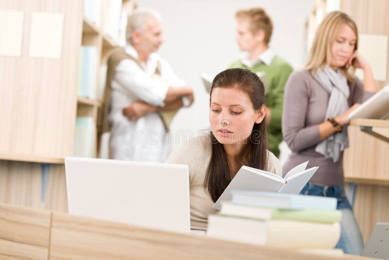 High School Library - Student with Book Stock Image - Image of library ...